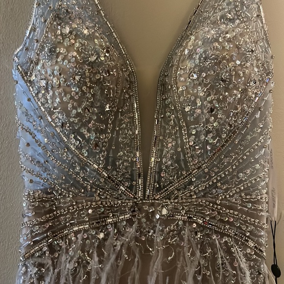 Jovani | Dresses | Jovani 3023 Sheer Bodice Beaded Adorned Feather ...